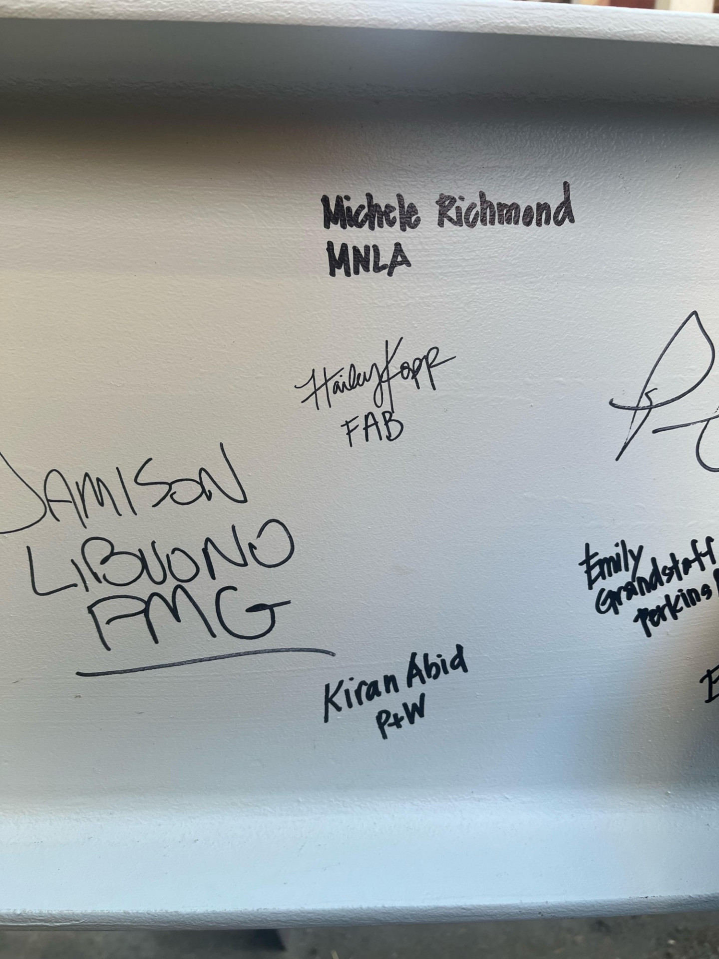Hailey Kopp signed an honorary steel beam to celebrate Roy and Diana Vagelos Science Center at ...